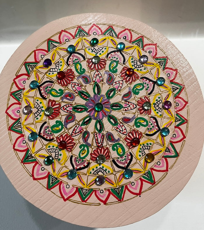 A beautiful pink round hand painted gift box